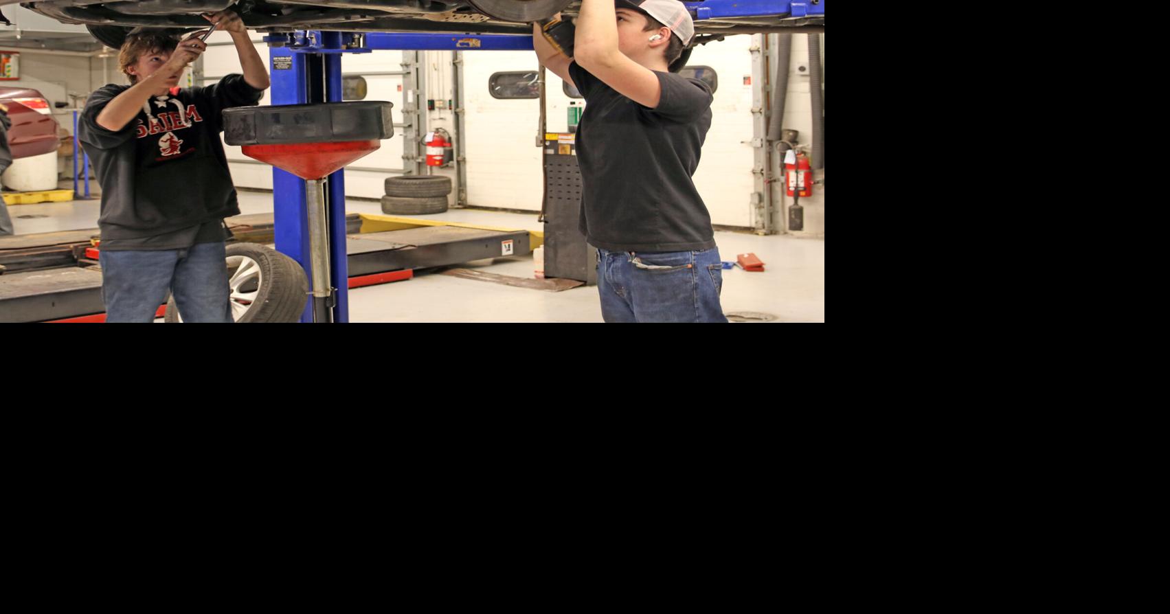 Two freshmen students, and future auto mechanics, sees Tim Sears ...