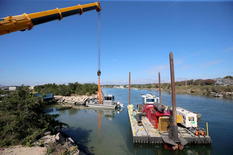PHOTOS: Dredging project preparation begins at Weekapaug Breachway ...