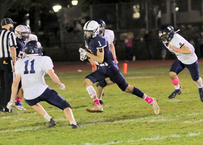 Football: 'Perfect night' — Tuck rushes for 230 yards, 3 TDs as ...