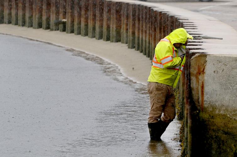 PHOTO: Wet work in a rainstorm | Westerly | thewesterlysun.com
