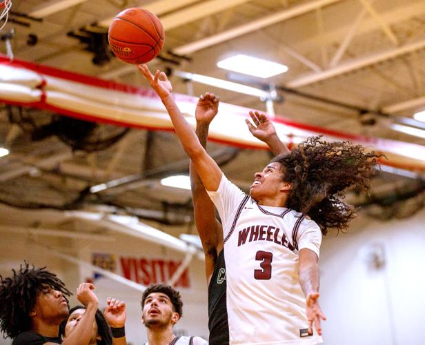 Boys basketball: Storybook run ends for Wheeler in Division IV ...
