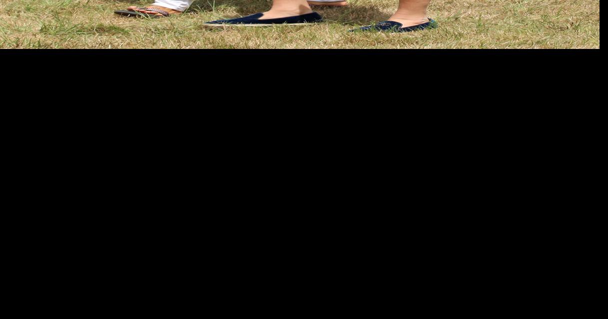Tina and Chris Harty enjoy a stroll past all the tent pavilions at the ...