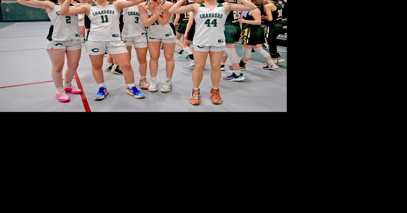 Chariho Chargers senior players celebrate their team’s 54-39 win over ...