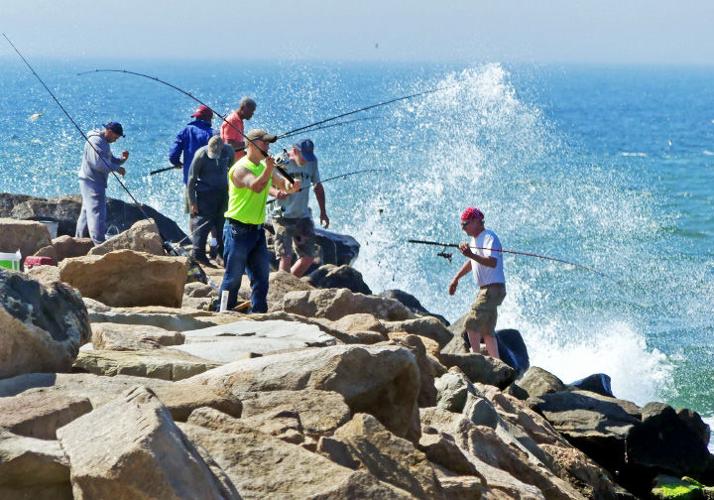 PHOTOS: The Charlestown Breachway was a crowded fishing spot on Friday ...
