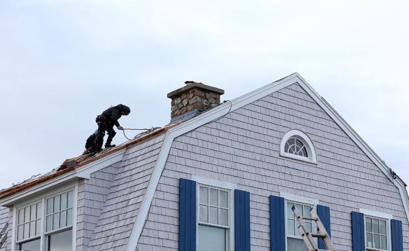 PHOTOS: Precarious perch on a roofing job | Westerly | thewesterlysun.com