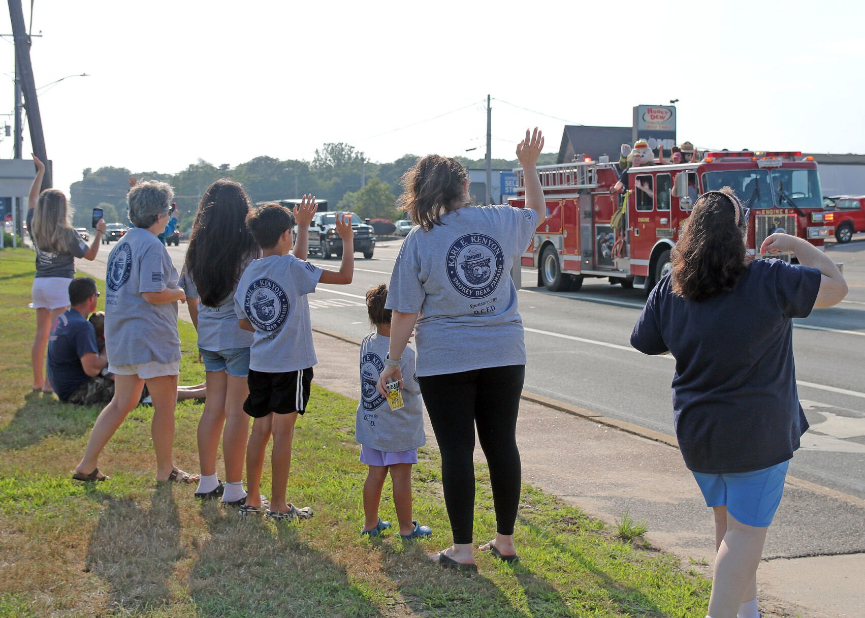 All along the parade route excited children and adults wave to the ...