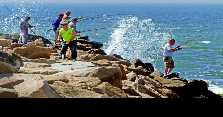 PHOTOS: The Charlestown Breachway was a crowded fishing spot on Friday ...