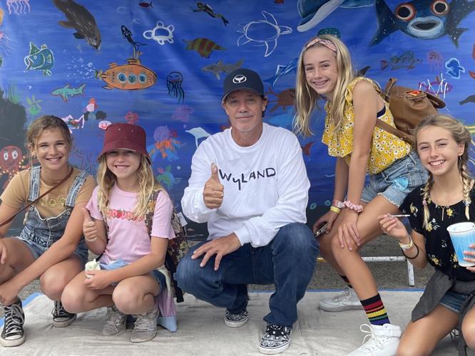 Wyland repaints 'Whaling Wall' mural in New London | Front Porch News ...