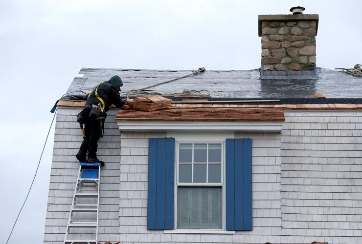 PHOTOS: Precarious perch on a roofing job | Westerly | thewesterlysun.com