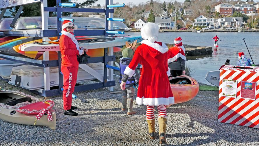 PHOTOS: Paddling along the Mystic River with Santa Claus | Stonington ...