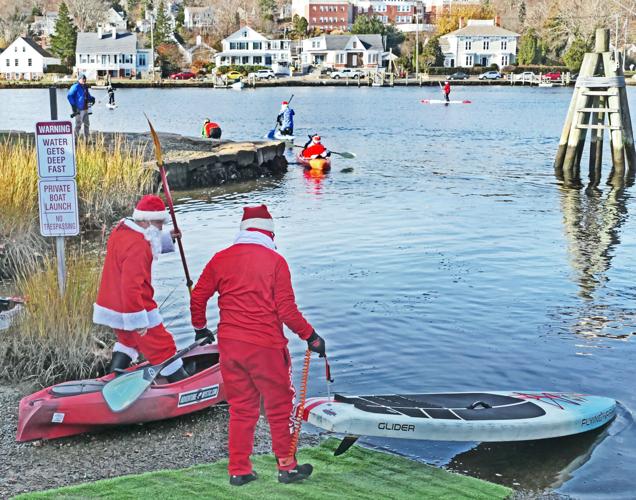 PHOTOS: Paddling along the Mystic River with Santa Claus | Stonington ...