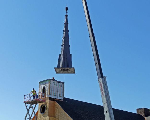 PHOTOS: Rebuilding of St. Michael Church hits milestone with placing of ...
