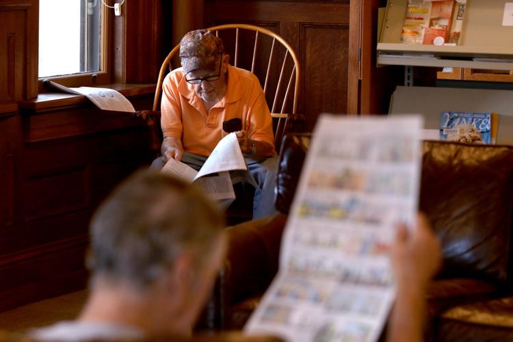 PHOTOS: Taking in the news at Westerly Library | Westerly ...