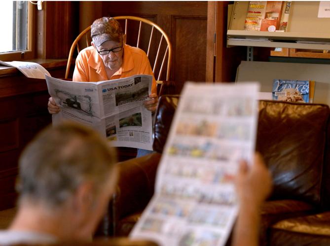 PHOTOS: Taking in the news at Westerly Library | Westerly ...