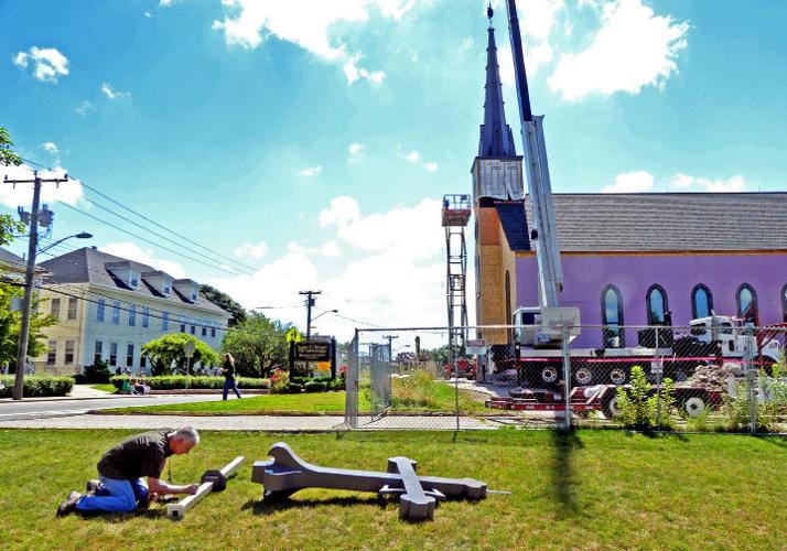 PHOTOS: Rebuilding of St. Michael Church hits milestone with placing of ...
