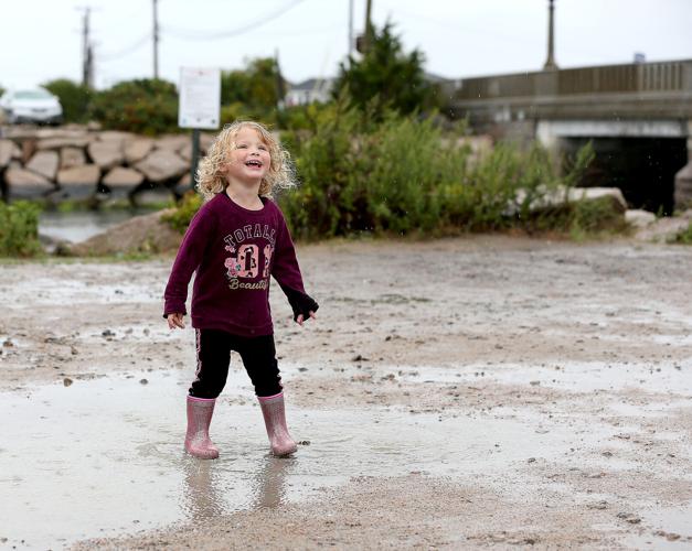 PHOTOS: Frolicking the puddles | Westerly | thewesterlysun.com