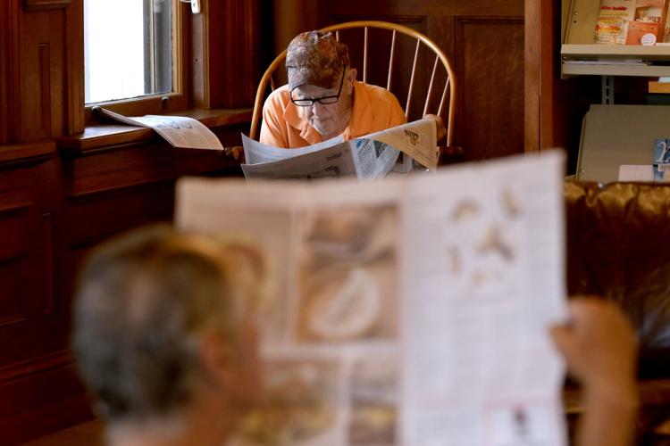 PHOTOS: Taking in the news at Westerly Library | Westerly ...