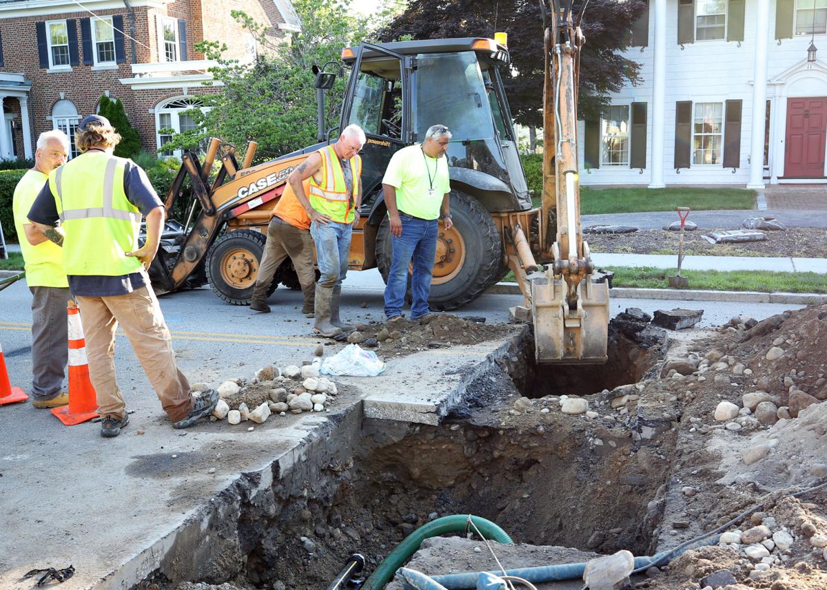 PHOTOS: Elm Street water main damaged in excavation mishap | Westerly ...