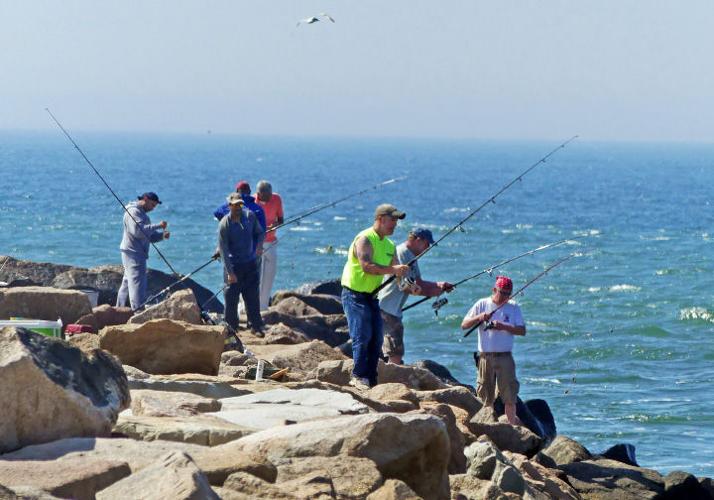 PHOTOS: The Charlestown Breachway was a crowded fishing spot on Friday ...