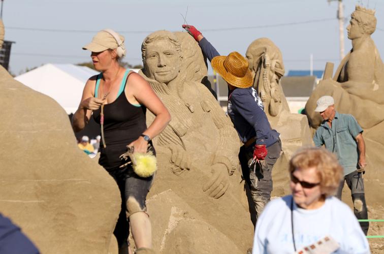 PHOTOS: Turning sand into art with Atlantis Rising at Misquamicut ...