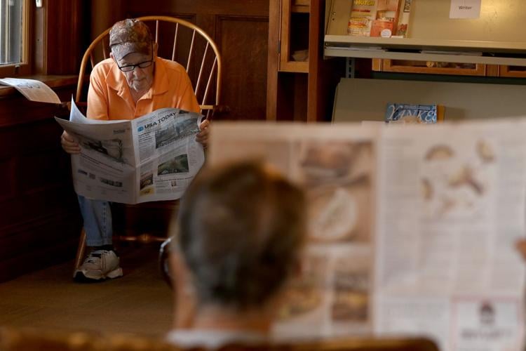 PHOTOS: Taking in the news at Westerly Library | Westerly ...
