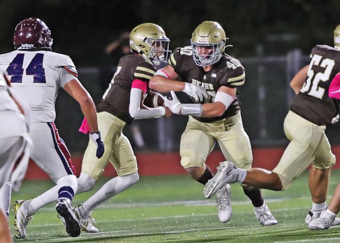 Football: Windham scores late, holds off Stonington's final drive for ...