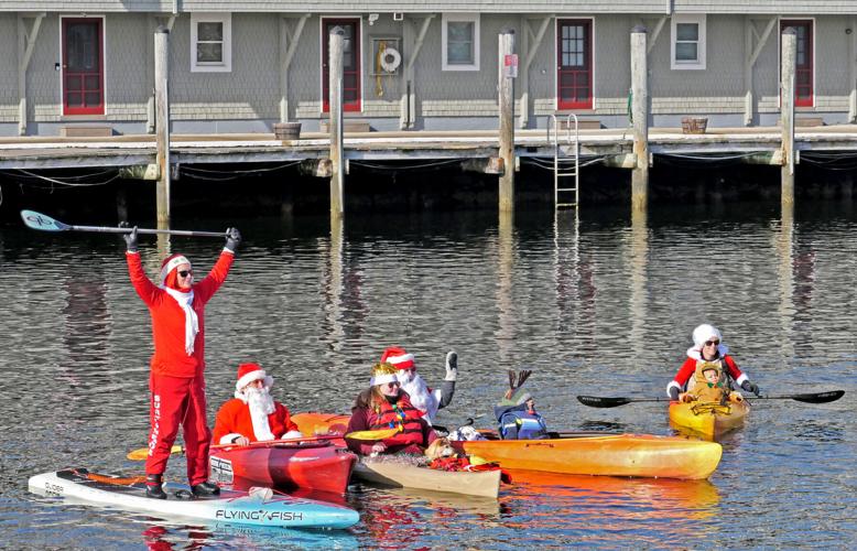PHOTOS: Paddling along the Mystic River with Santa Claus | Stonington ...