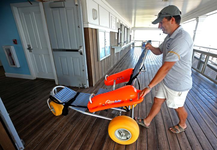 PHOTOS: Vuono Charity Fund gifts flotation chairs to town beach ...