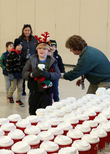 PHOTOS: Springbrook kindergartners ring the bells of the season ...