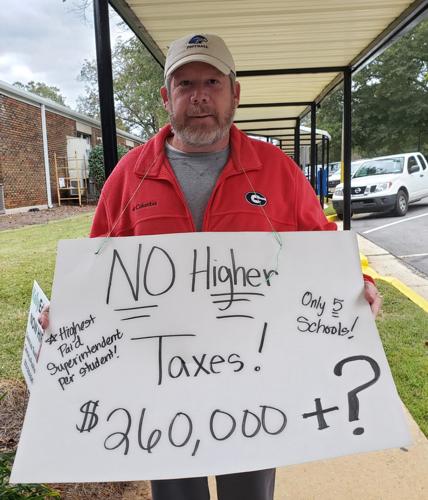 Crowd spews angst over millage vote | Times Georgian | times-georgian.com