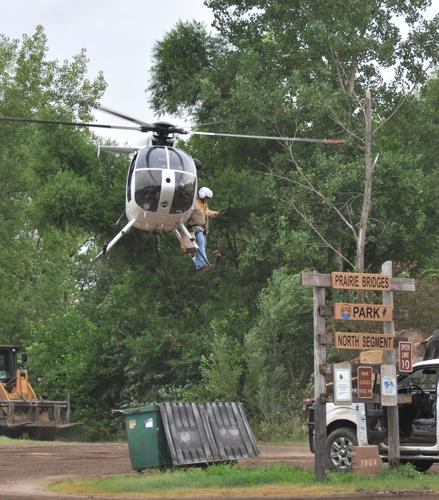 Helicopter used to install power lines at Prairie Bridges | News ...