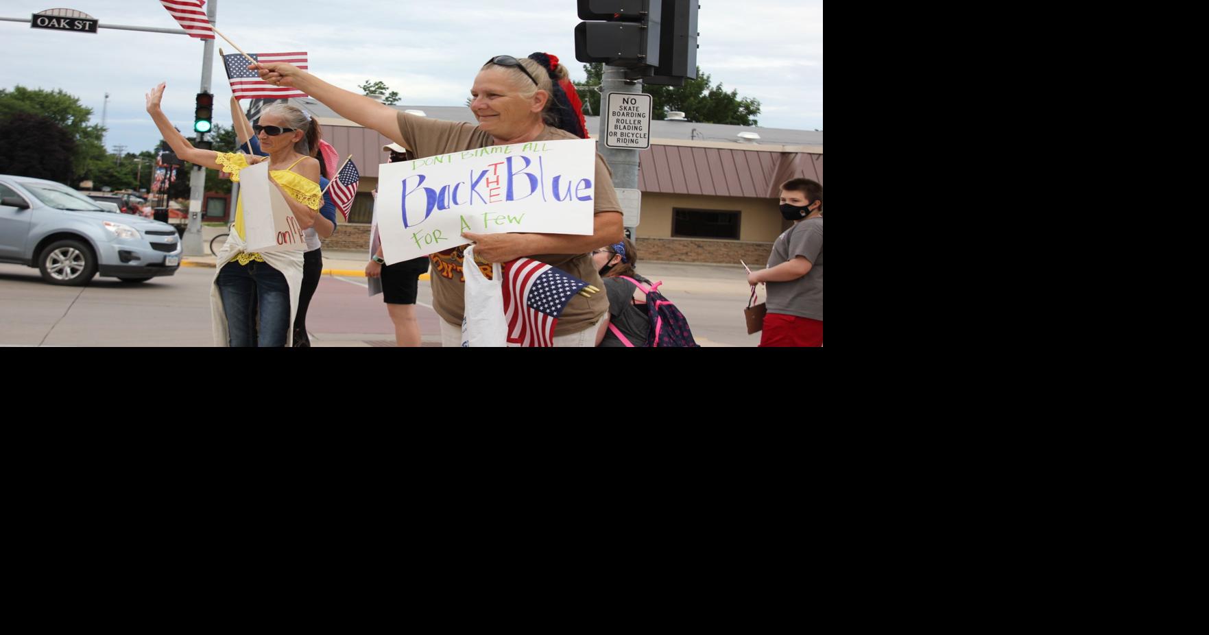 Counter protesters 'Back the Blue' with rival demonstration | News ...