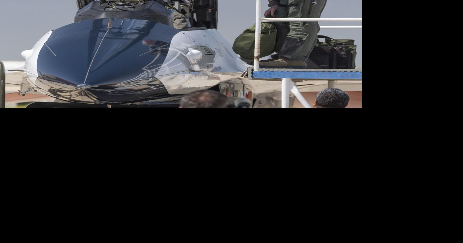 Air Force Secretary Frank Kendall, right, and Maj. Ryan Forystek, an X ...
