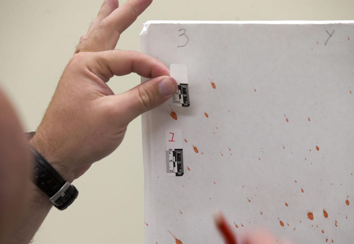 Local investigators take UNA criminal justice class on blood splatter ...