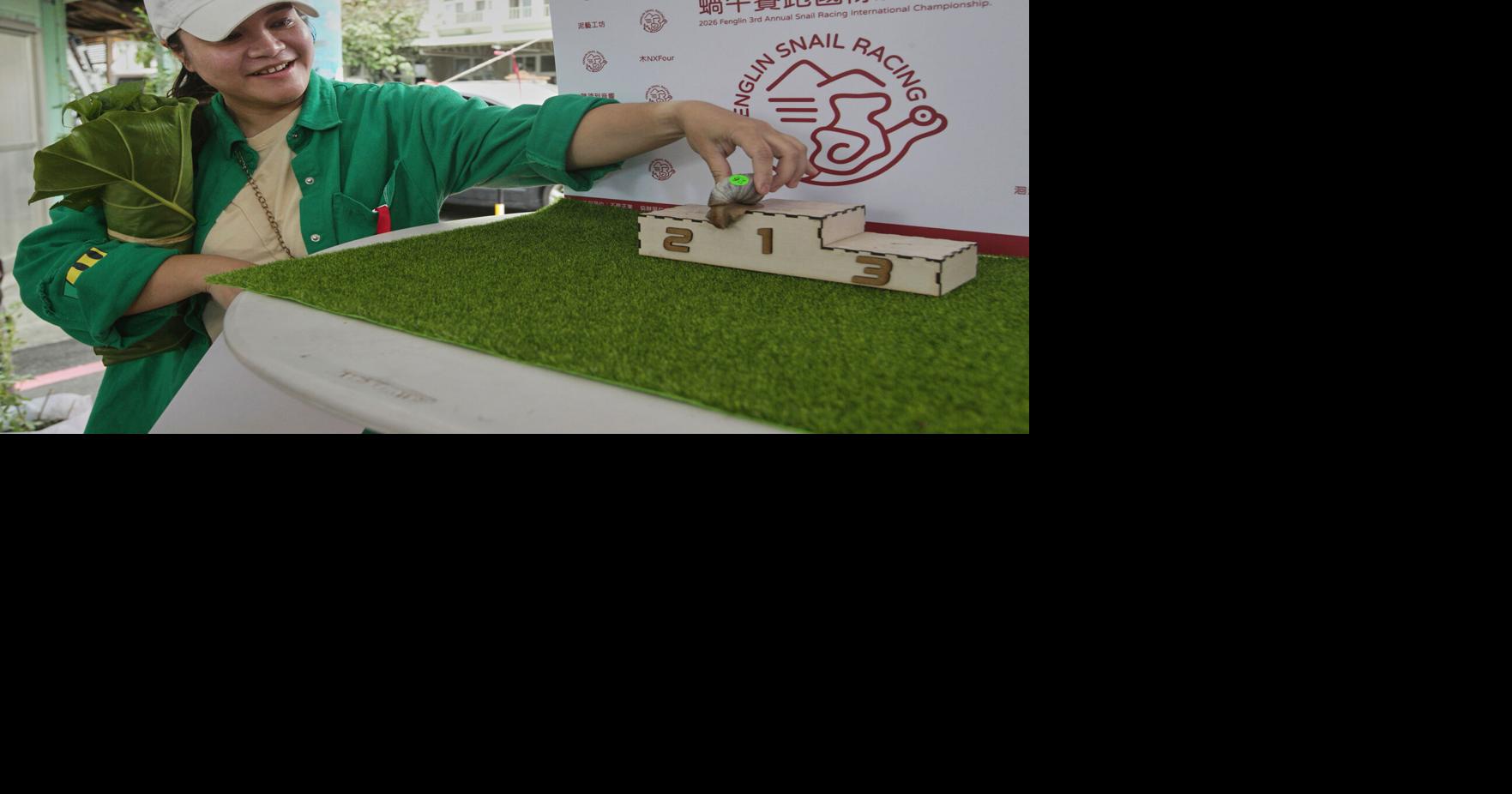A Taiwanese town embraces a slow pace of life through a snail race ...