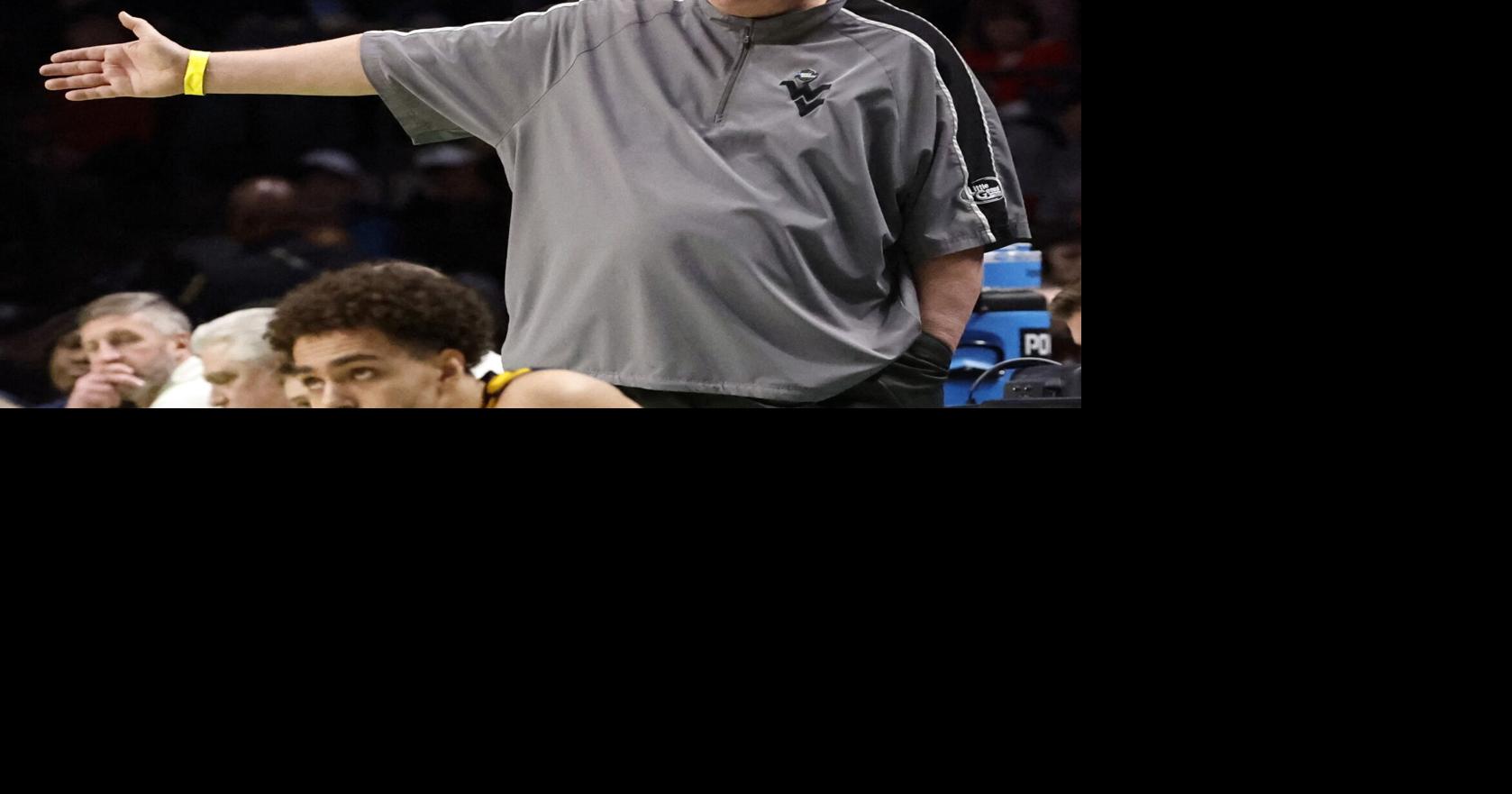 West Virginia's Huggins will take pay cut, suspension for slur | Sports ...