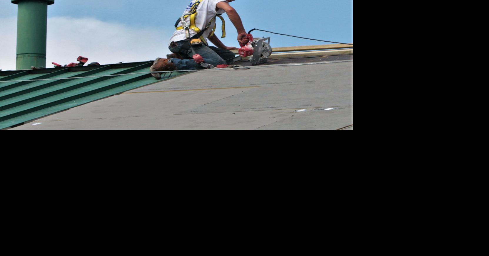 Roofers begin replacing metal roof on Muscle Shoals library | News ...