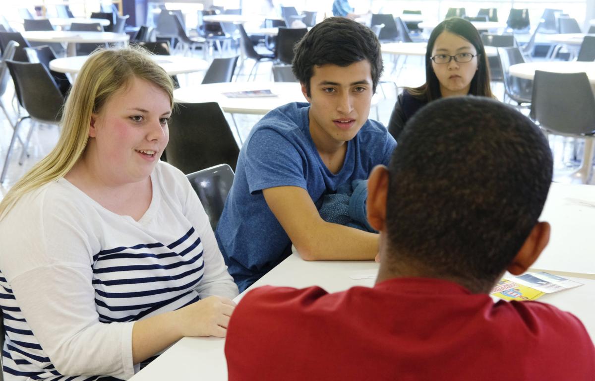 Conversation partners encourage student interaction | Education ...