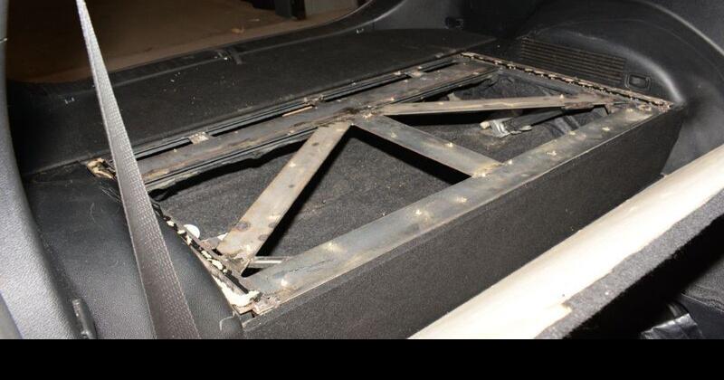 Toronto police find hidden trap compartment in car trunk filled with ...