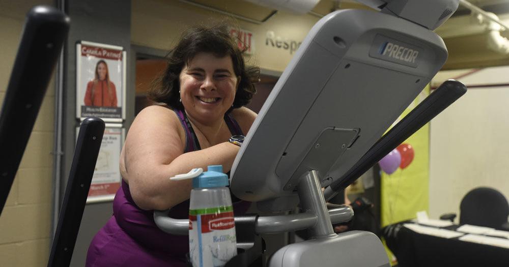 North York YMCA employee hits the elliptical machine to raise money for the Megathon challenge