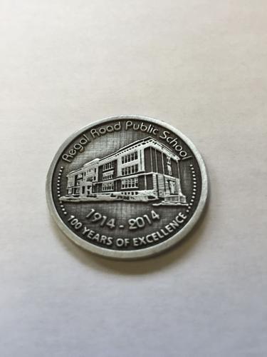 Centenary coin minted for Regal Road Public School