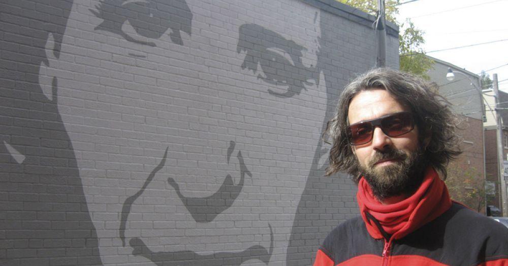 Artist brings mural painting to Gerrard and Main streets