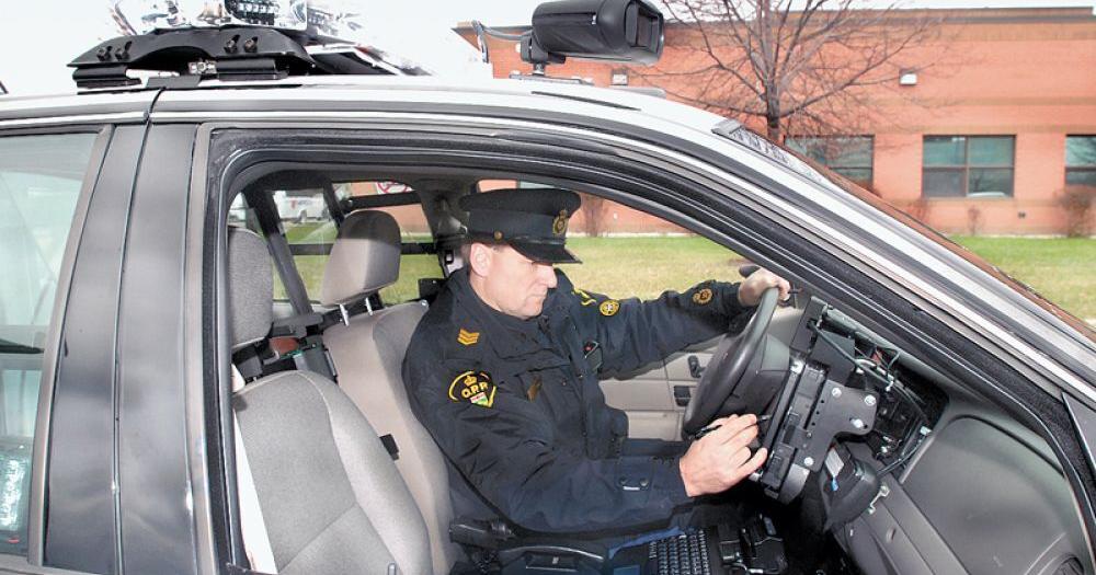 Three OPP cruisers equipped with licence plate scanners