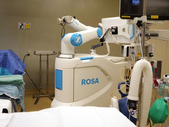 Robotic surgical assistant enables precise knee implants