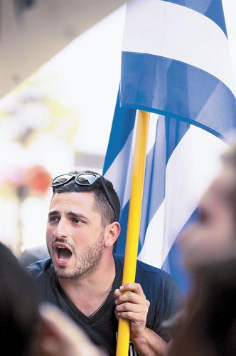 WORLD CUP: Greek fans gather on the Danforth for key match against Japan