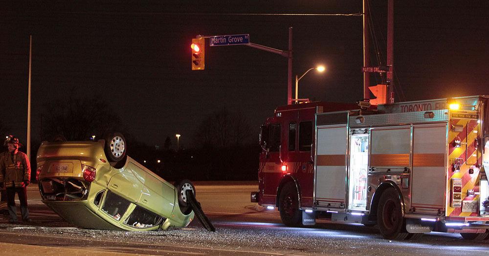 Two vehicle crash at Martin Grove and Eglinton flips car