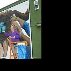 Helping hands mural reflects care available at outreach centre