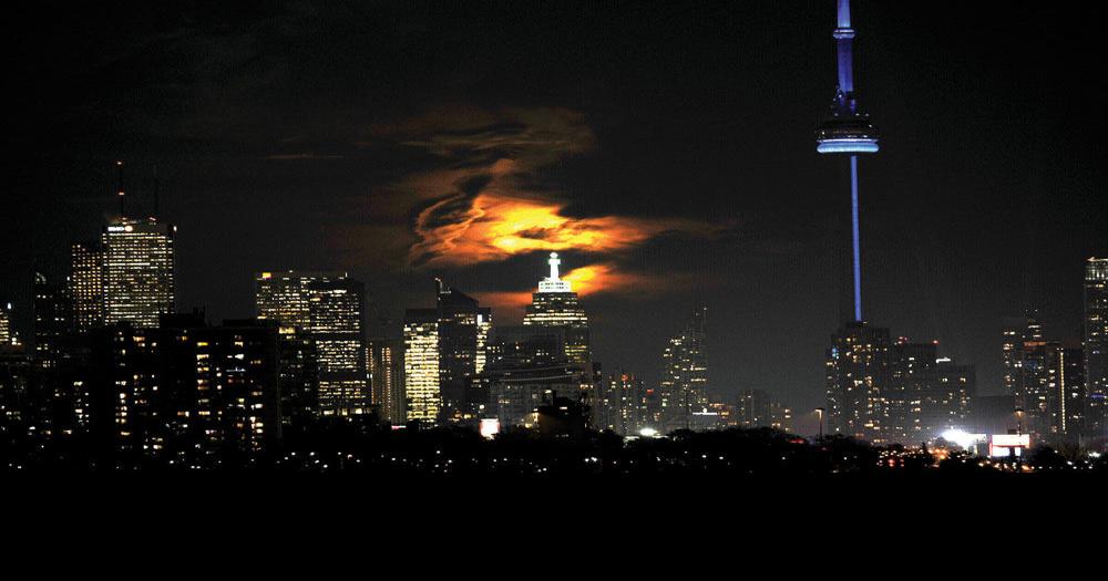 Supermoon lights up the night sky over the City of Toronto | News ...
