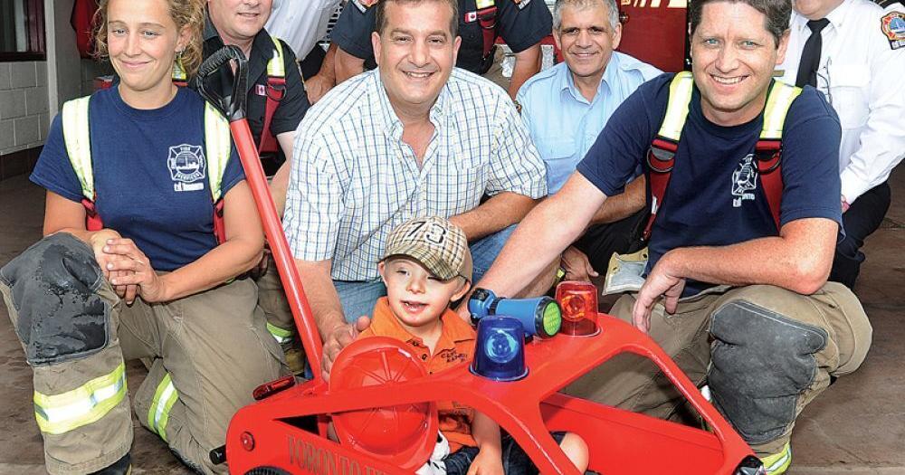 Little boy gets firefighting gift