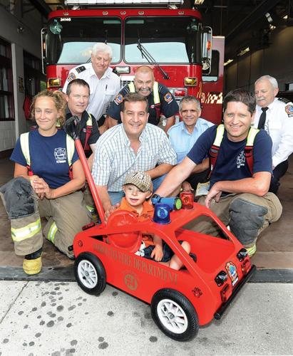 Little boy gets firefighting gift